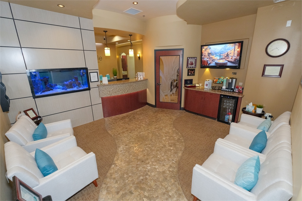 Waiting area refreshment bar front desk at Nu Smile Roseville Dental ...